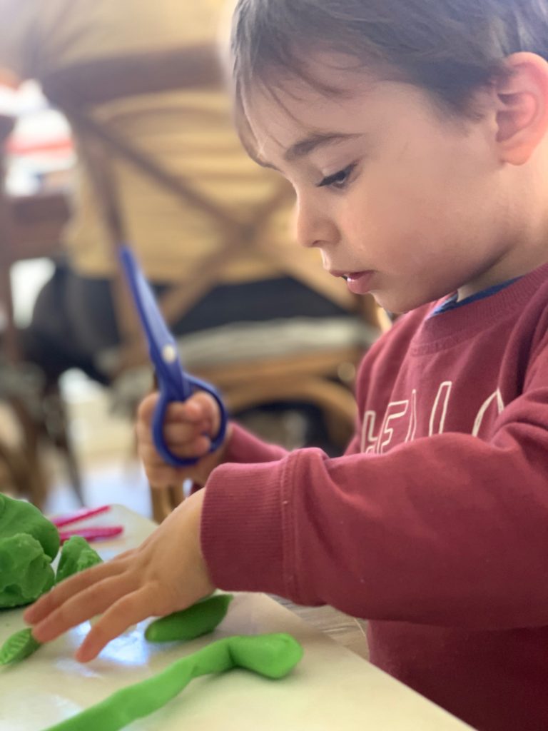 Scissor Skill Practice: Cutting Playdough - Playgroup WA